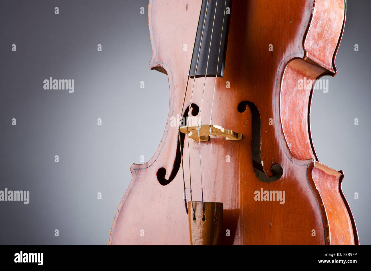 Music Cello in the dark room Stock Photo - Alamy