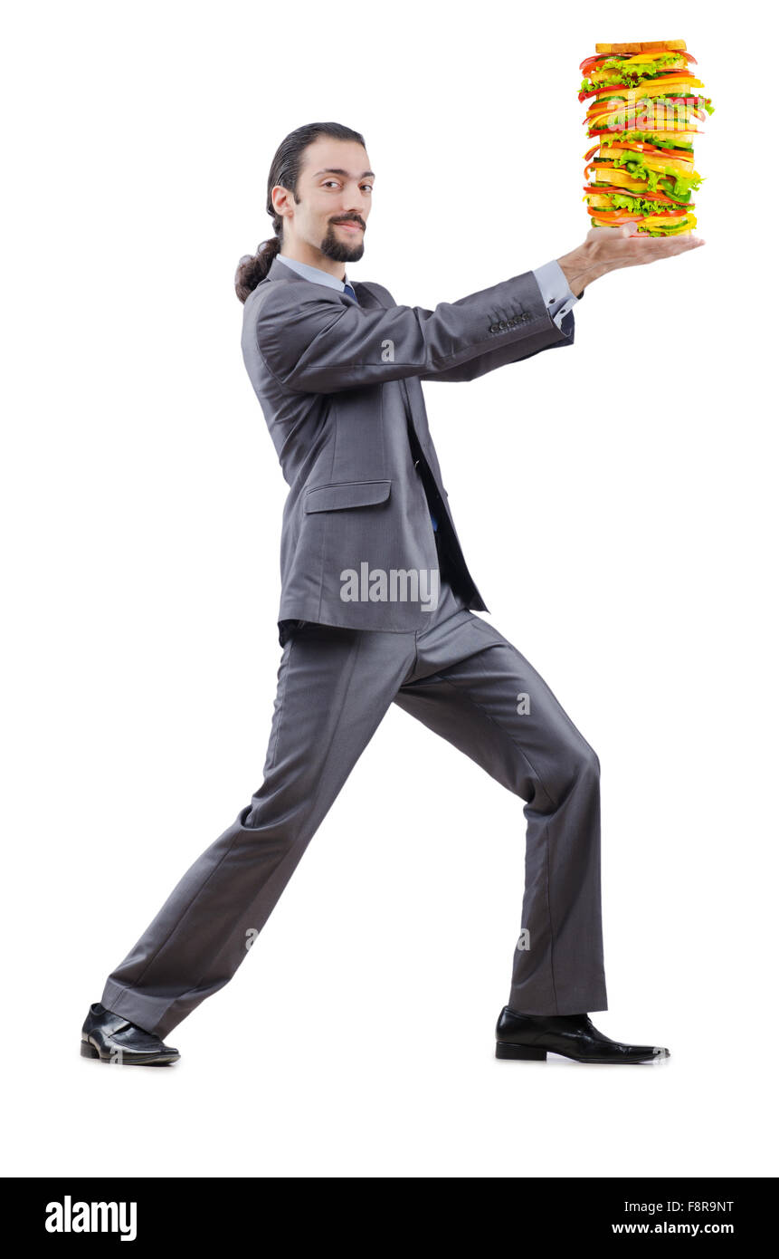 Man and giant sandwich on white Stock Photo - Alamy