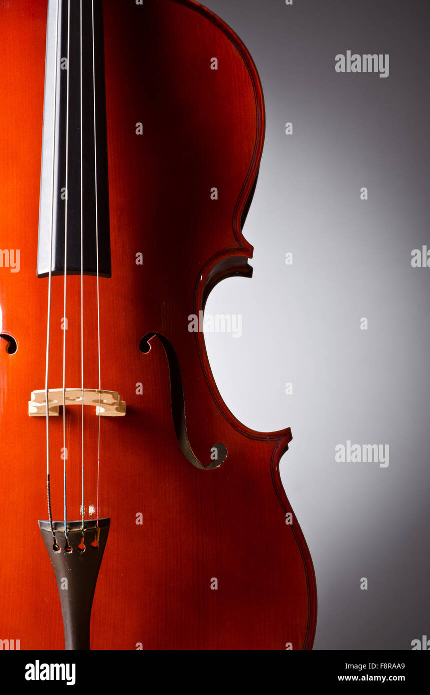 Music Cello in the dark room Stock Photo - Alamy