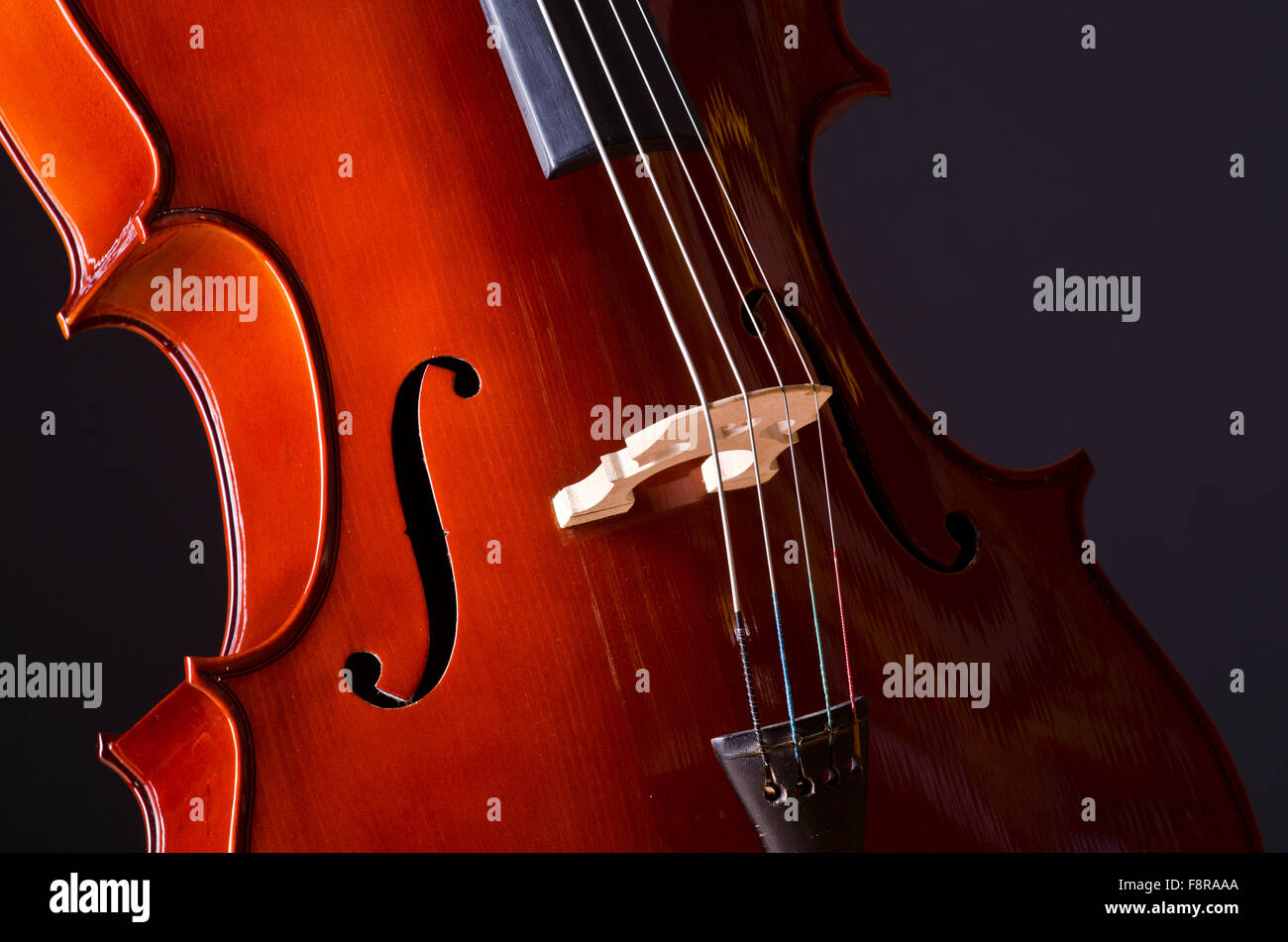 Music Cello in the dark room Stock Photo - Alamy
