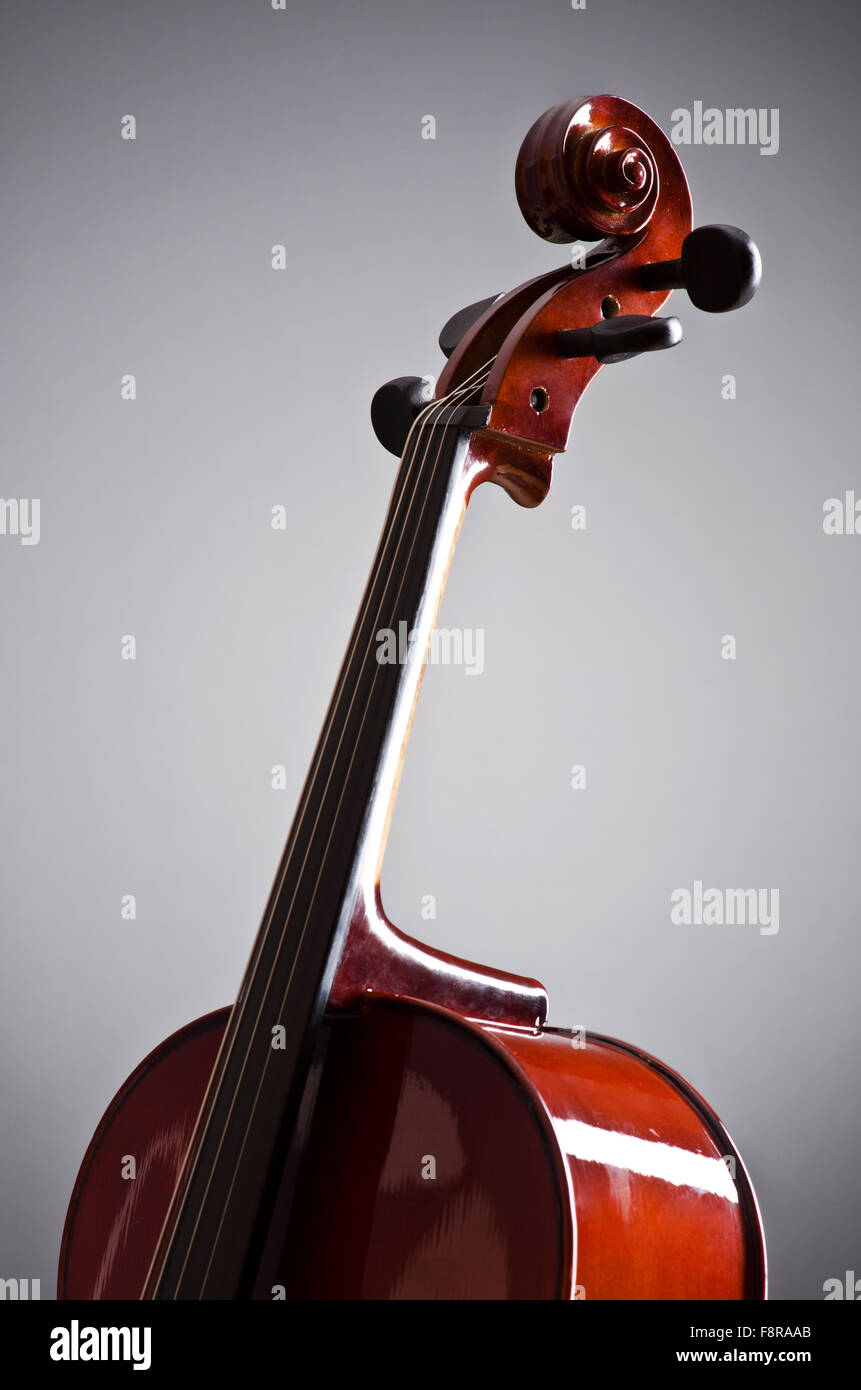 Music Cello in the dark room Stock Photo - Alamy