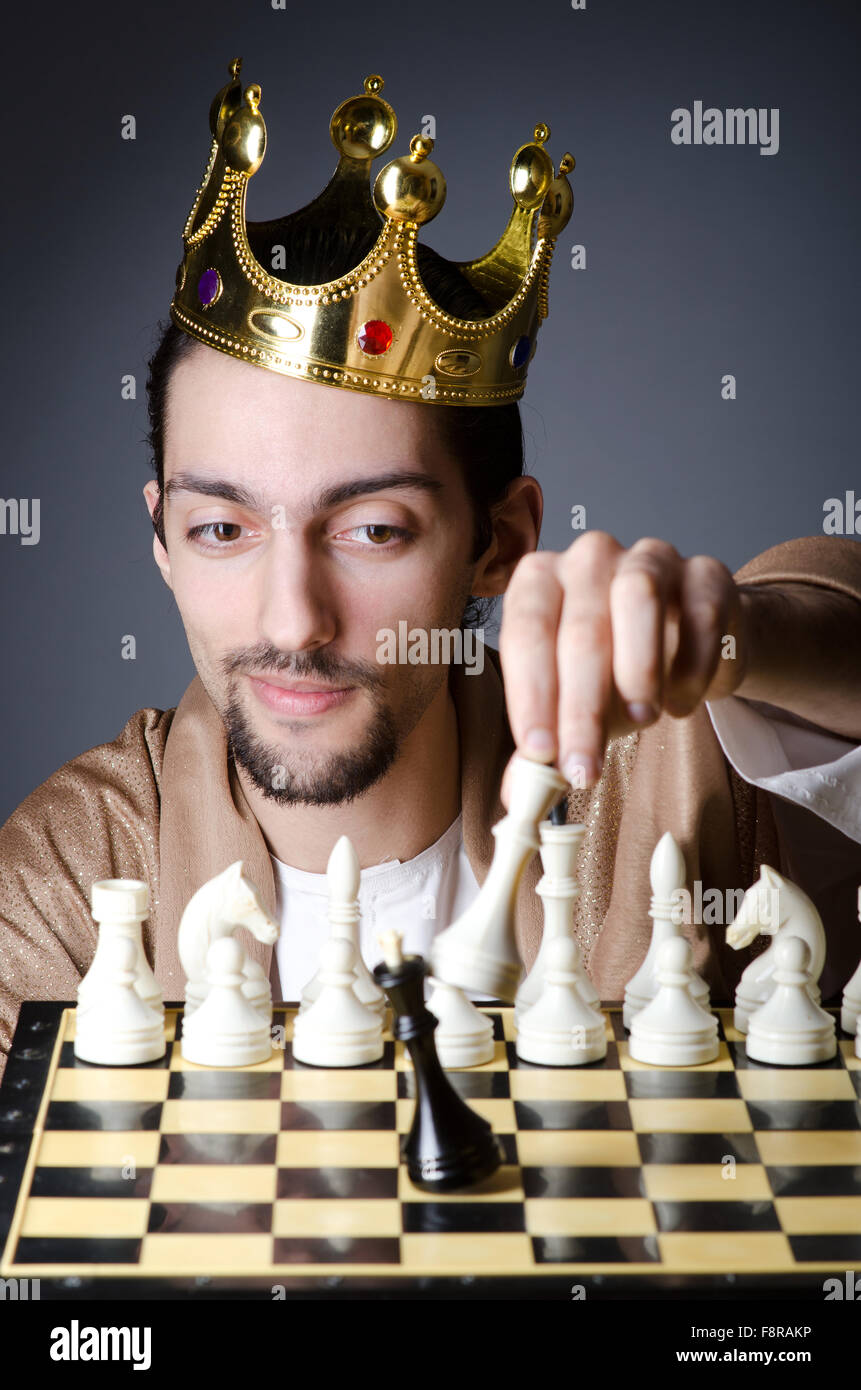 Chess player playing his game Stock Photo - Alamy