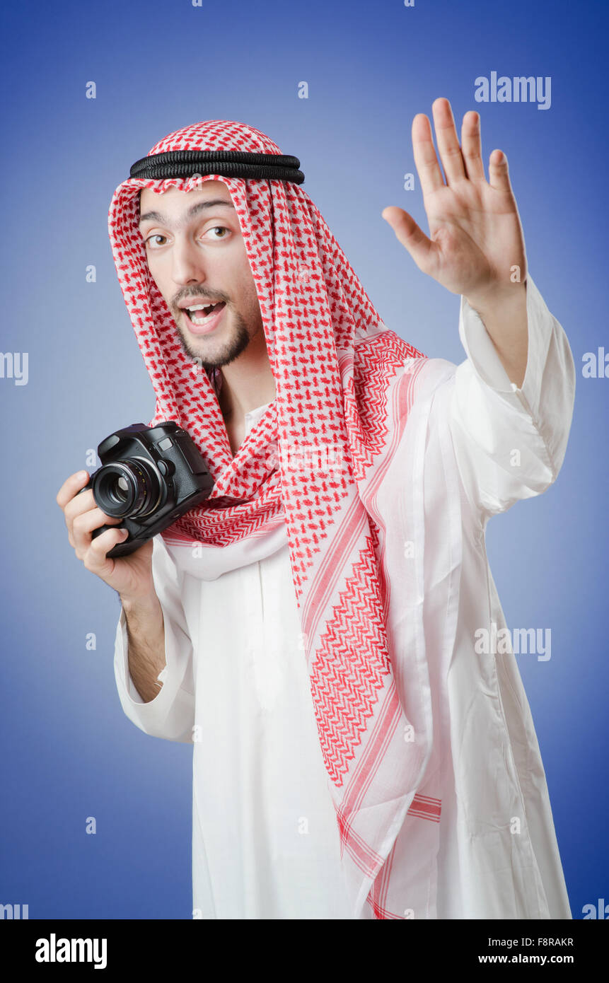 Arab photographer in studio shooting Stock Photo - Alamy