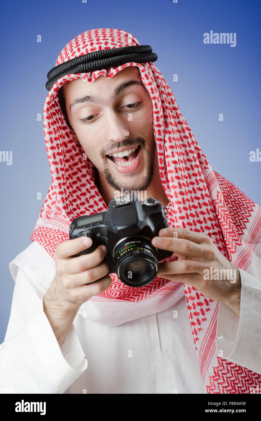 Arab photographer in studio shooting Stock Photo - Alamy