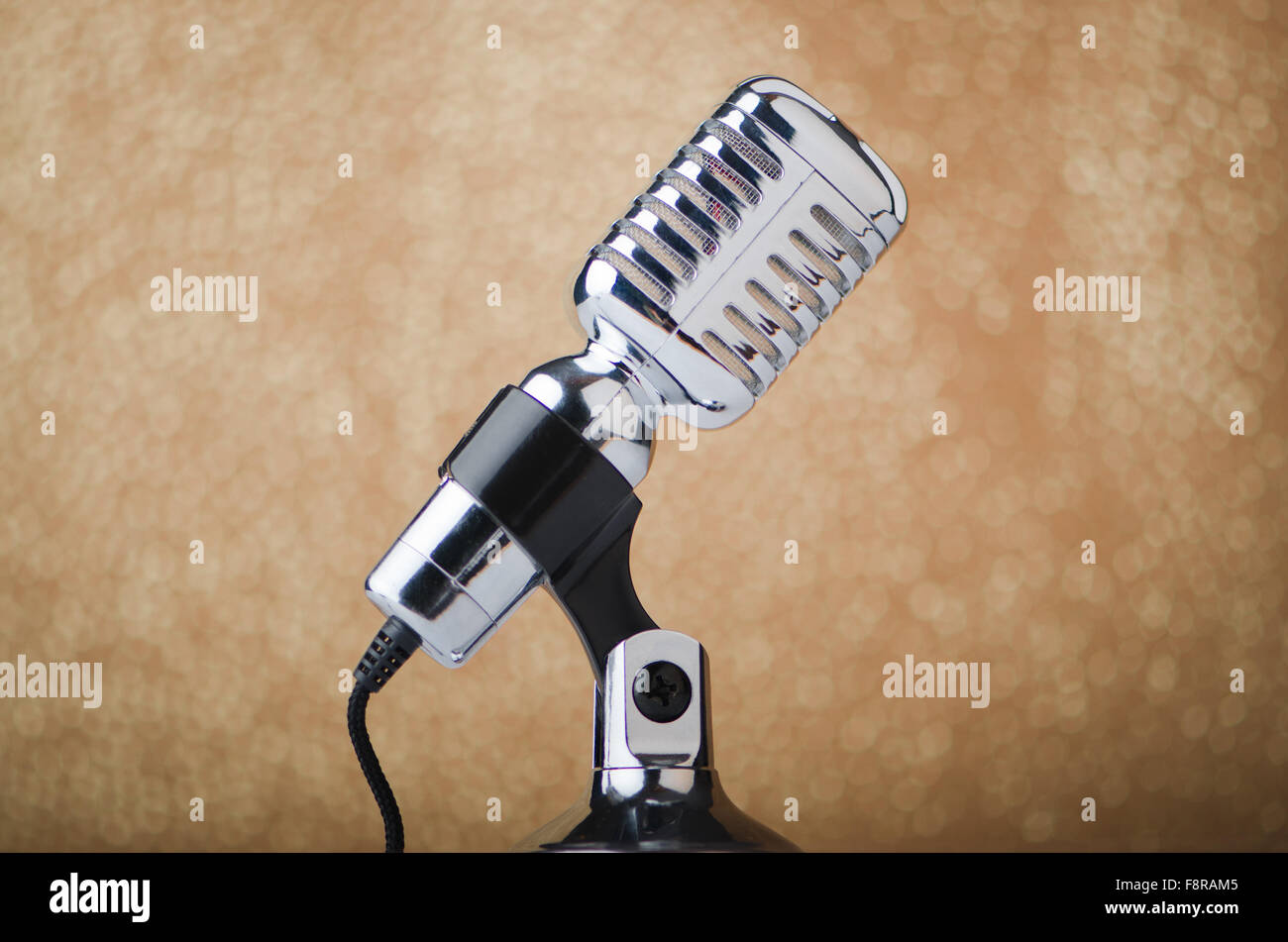 Old vintage microphone on background Stock Photo - Alamy