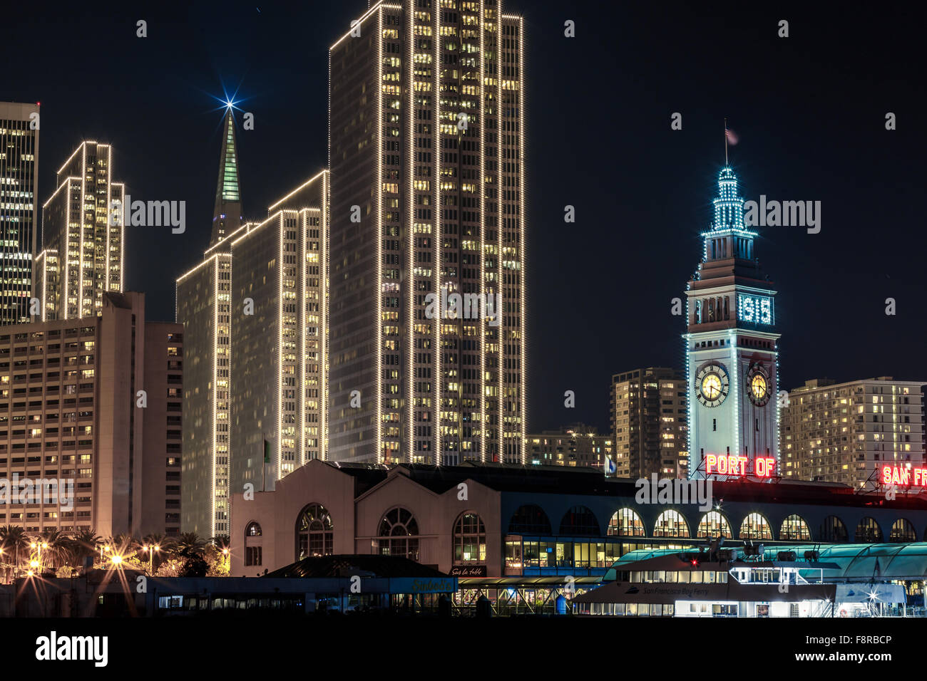 Ferry Building and Embarcadero Center illuminated at night in San ...