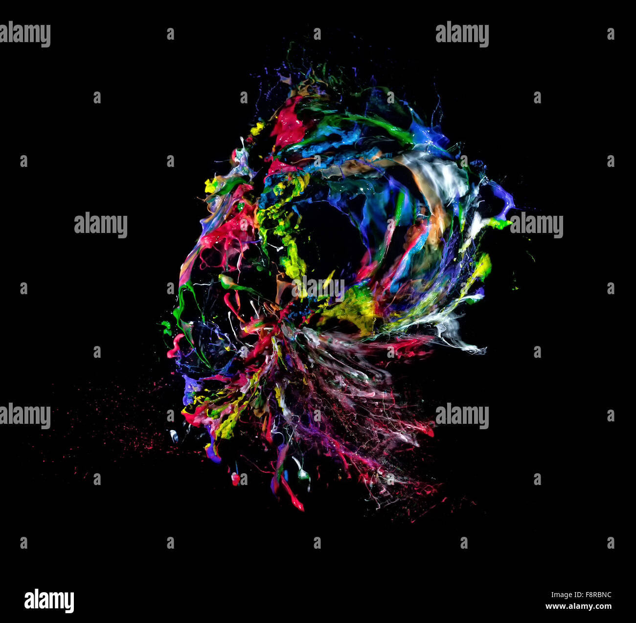 explosion of colorful paint on black background Stock Photo - Alamy