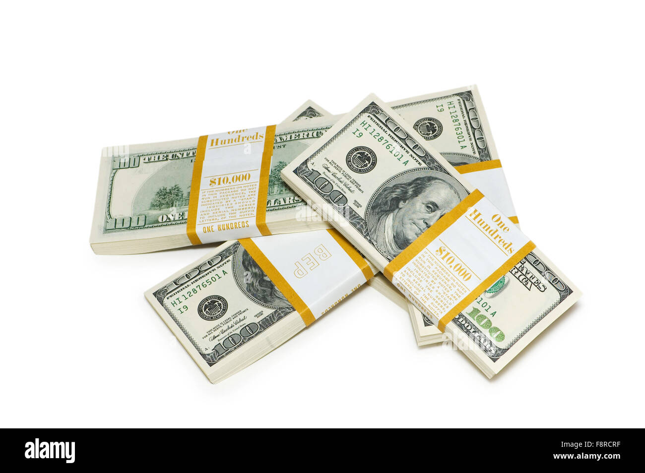 Ten thousand dollar stacks on the white Stock Photo - Alamy