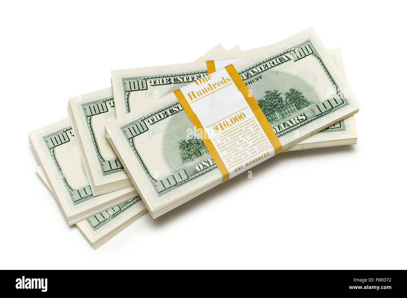 Ten thousand dollar stacks on the white Stock Photo - Alamy