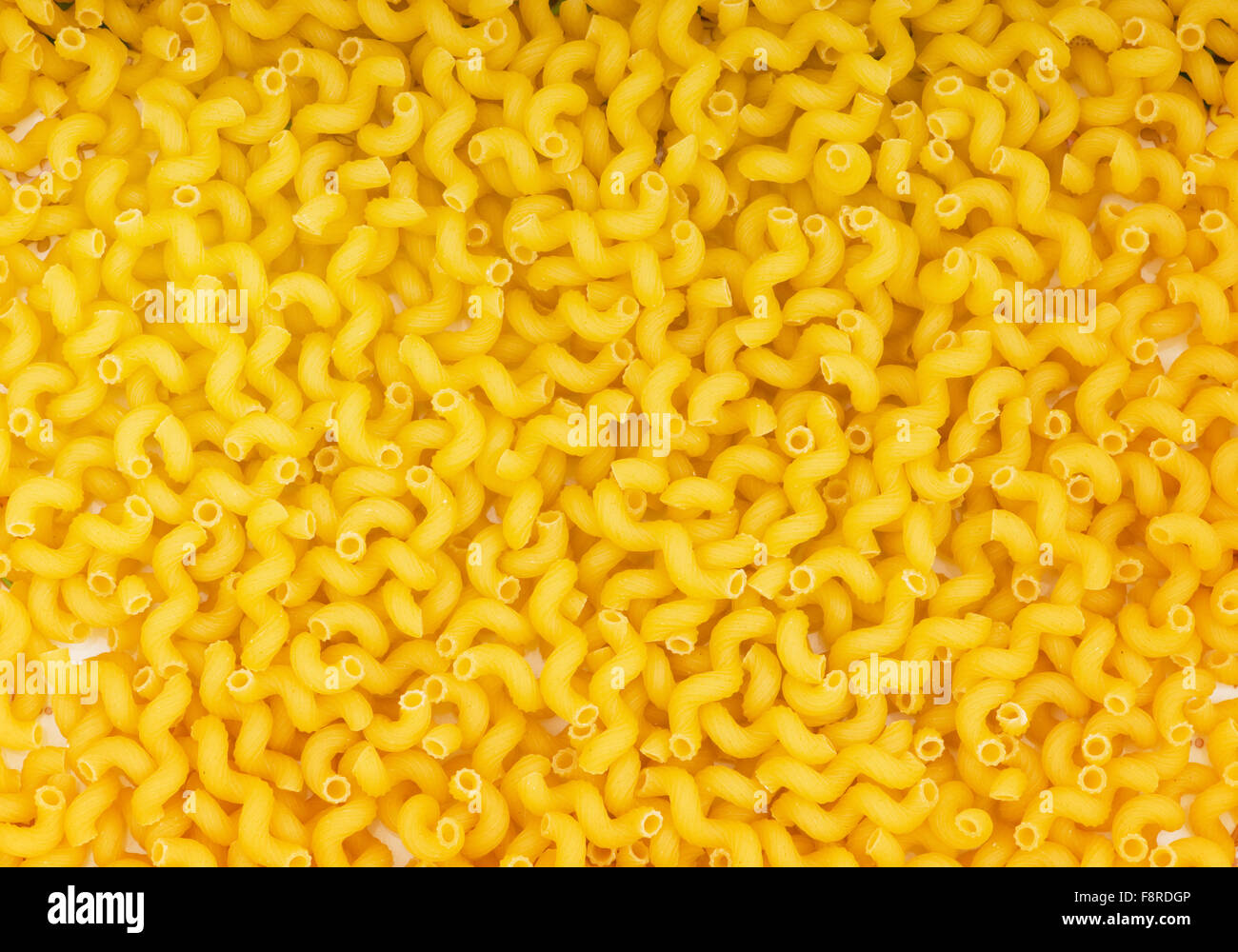 Close up of italian pasta - spiral shaped Stock Photo - Alamy