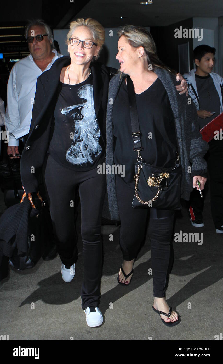 Sharon Stone wearing a black t-shirt with 'Where There Is Smoke, There ...