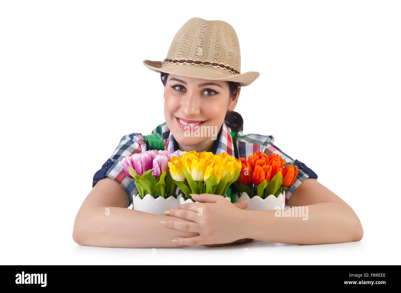 Girl watering plants on white Stock Photo - Alamy