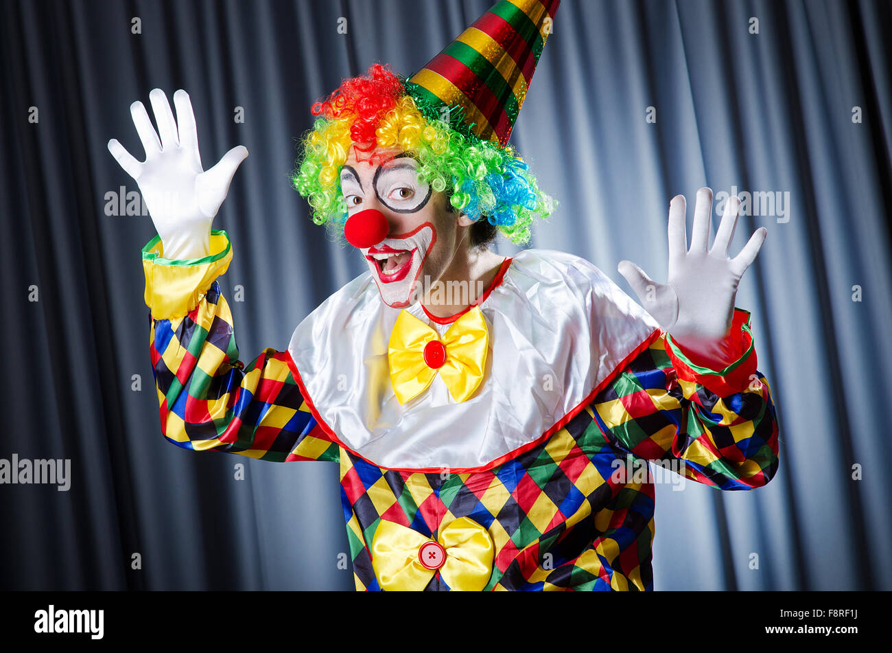 Funny clown in studio shooting Stock Photo - Alamy