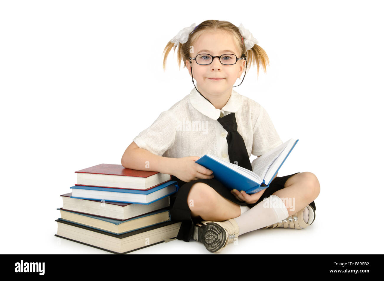 Little girl with books on white Stock Photo - Alamy