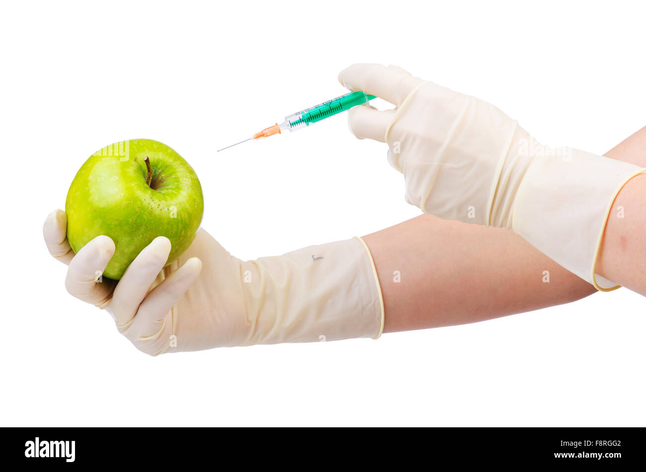 Chemical experiment with apple and syringe Stock Photo - Alamy
