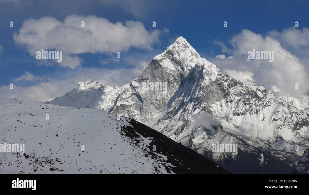Ama Dablam and clouds, view from Dzongla Stock Photo - Alamy