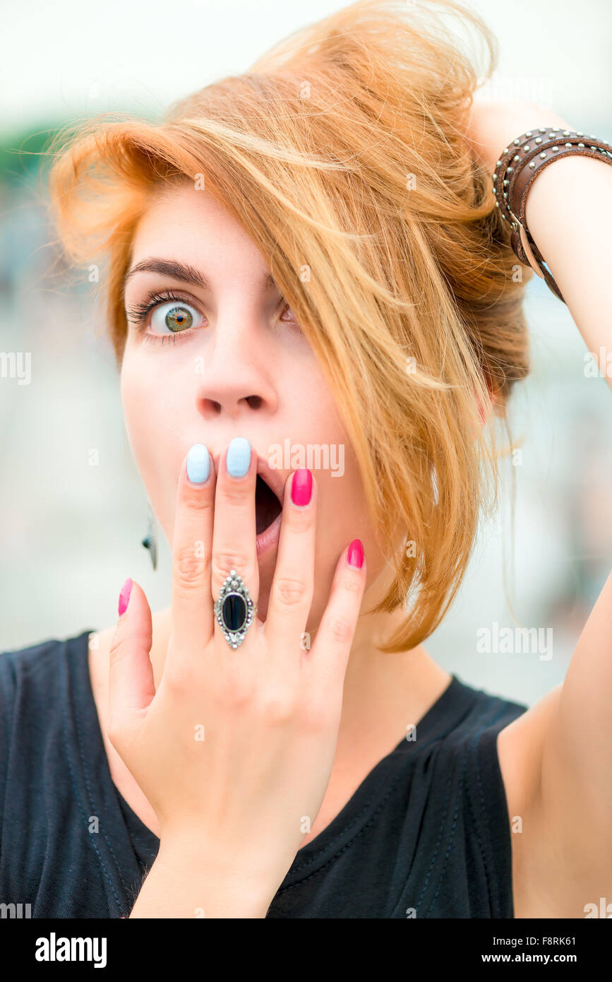 beautiful girl very surprised face close up Stock Photo - Alamy