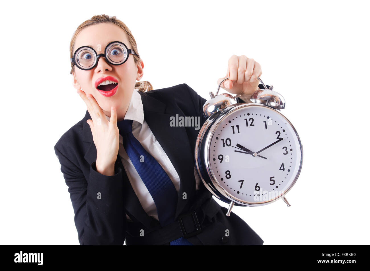 Nerd businesswoman with gian alarm clock Stock Photo - Alamy