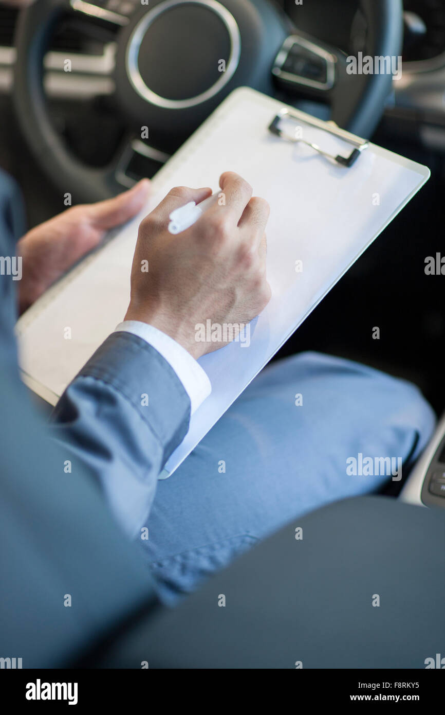 Professional auto mechanic holding new hi-res stock photography and ...