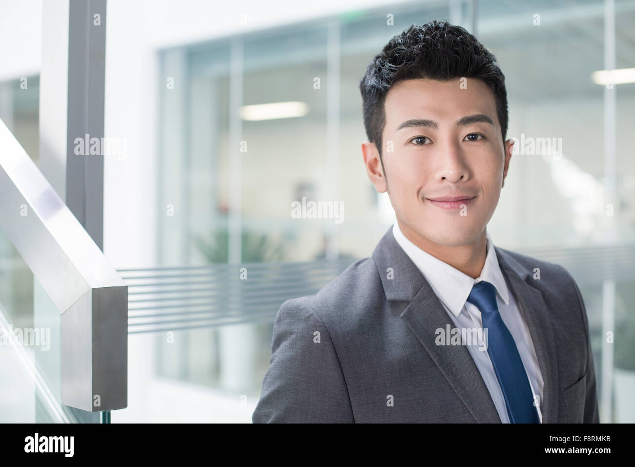 Portrait of young businessman Stock Photo - Alamy