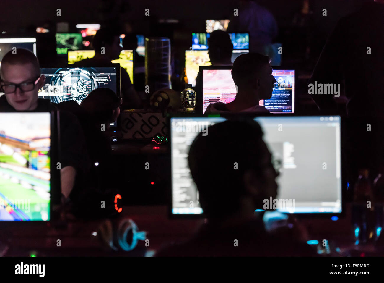 Thun, Switzerland. 10th Dec, 2015. The Silhouettes of computer gamers ...