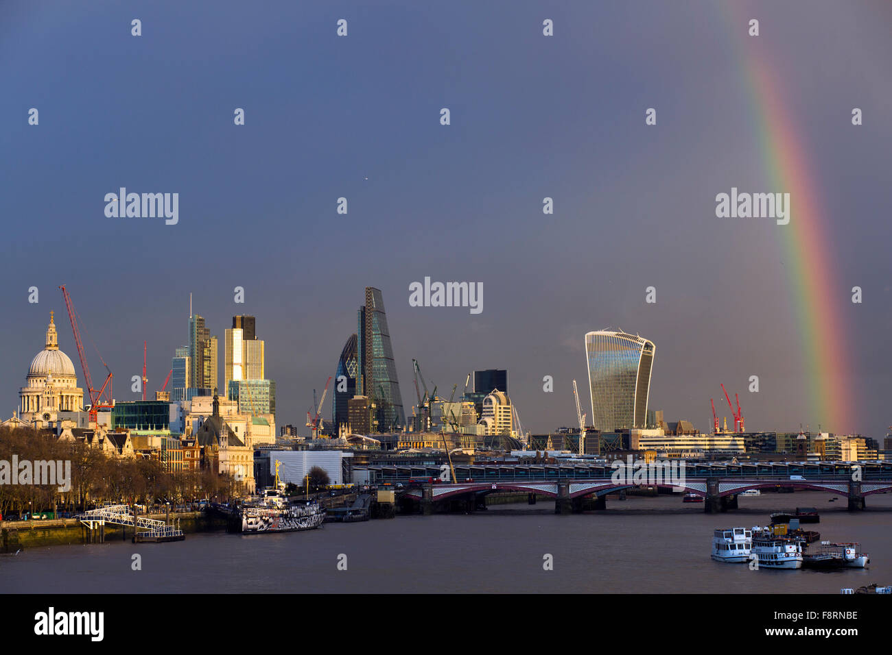 Rainbow over London City skyline Stock Photo - Alamy