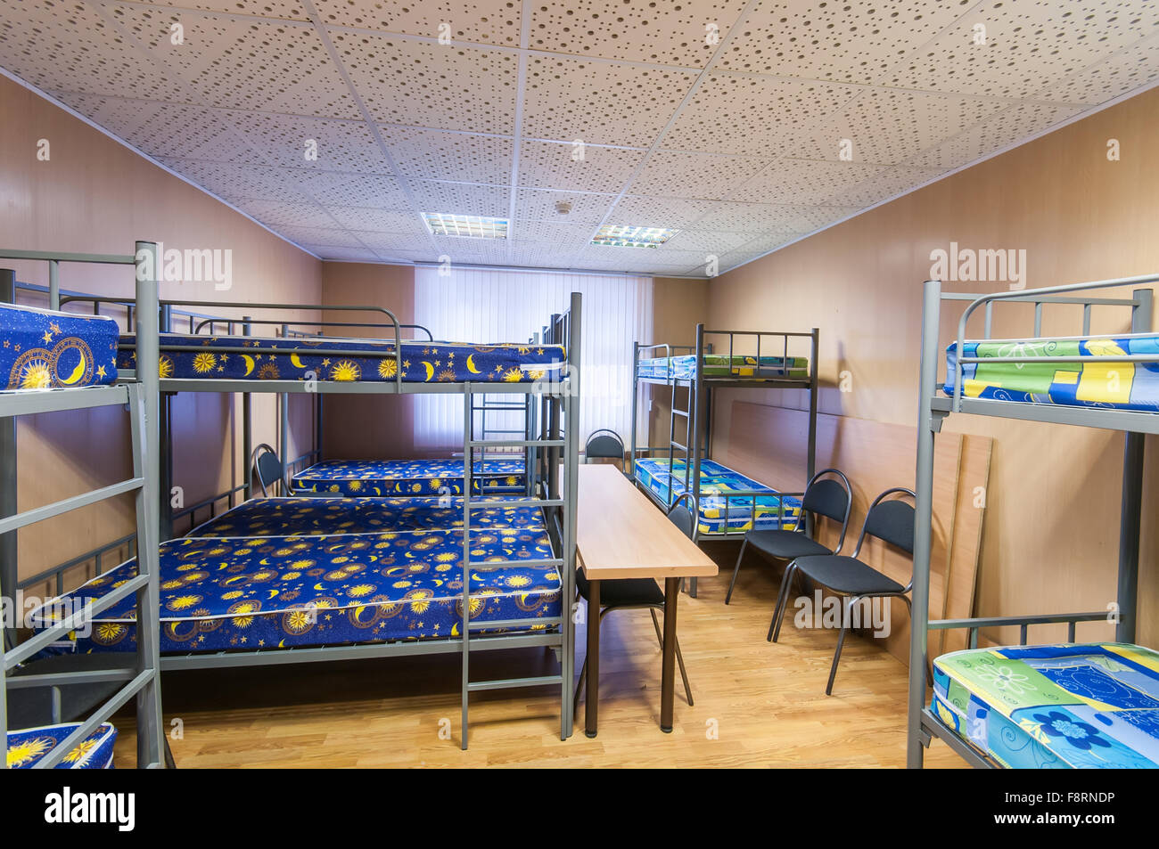 bunk metal beds in clean hostel room Stock Photo - Alamy