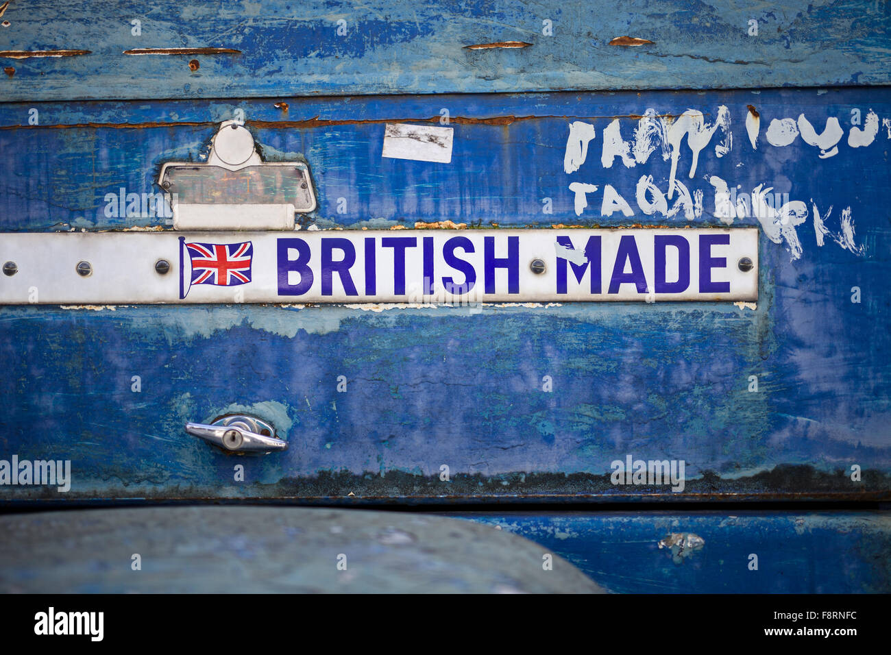Sign on an old blue machine saying British made Stock Photo - Alamy