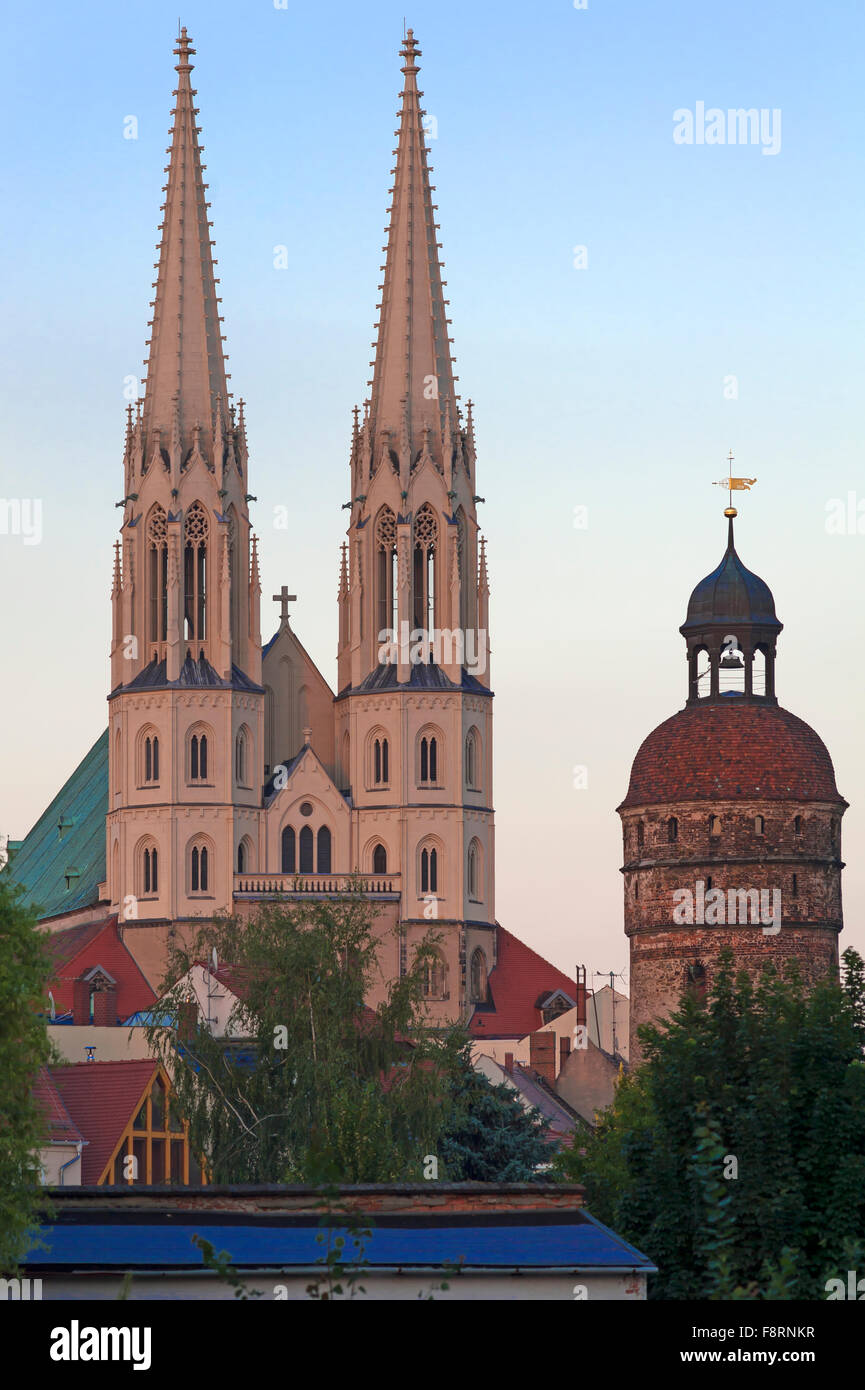 Towers of the late Gothic Church of St. Peter in the evening light ...