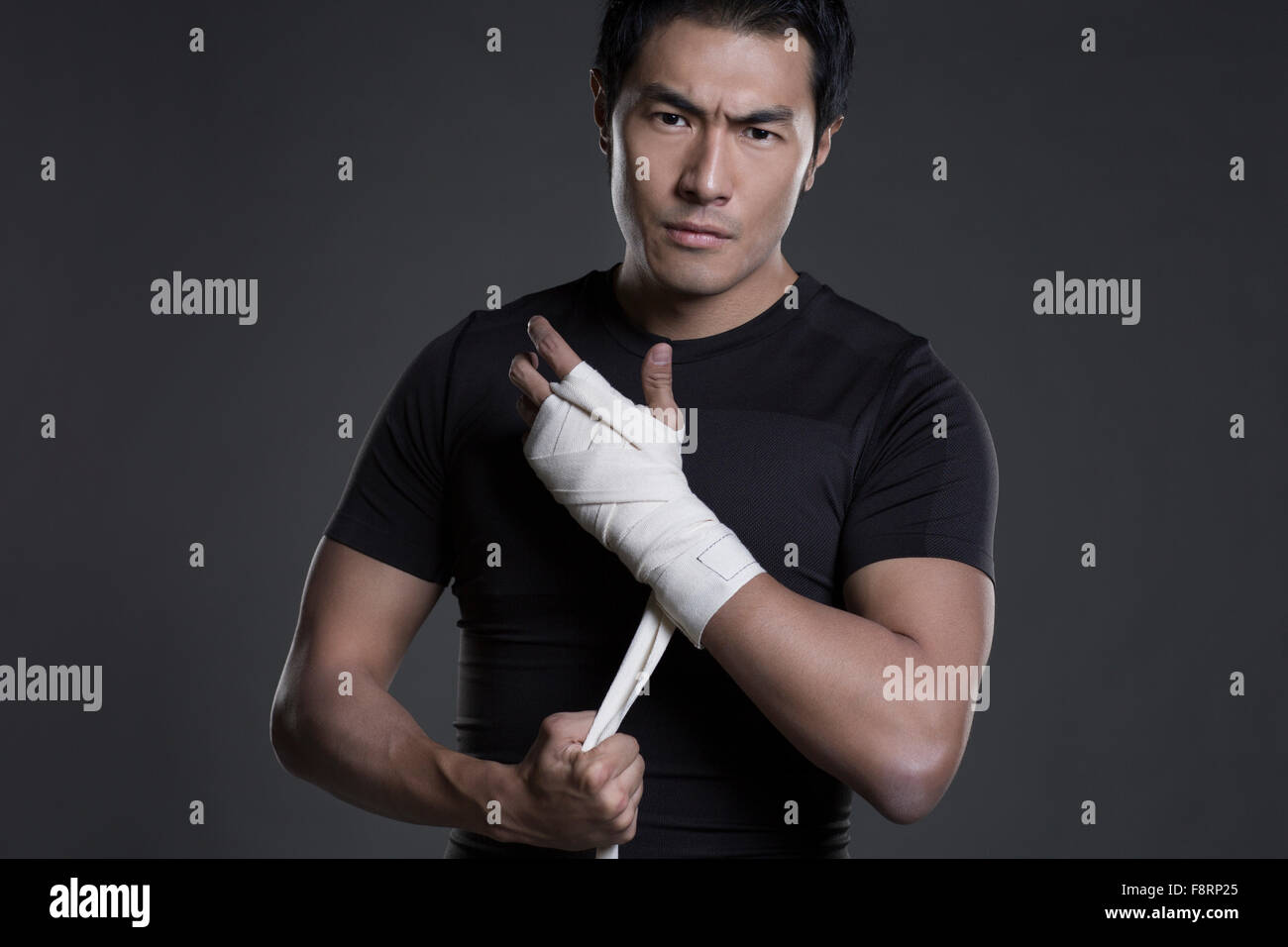 Boxer wrapping hands Stock Photo - Alamy