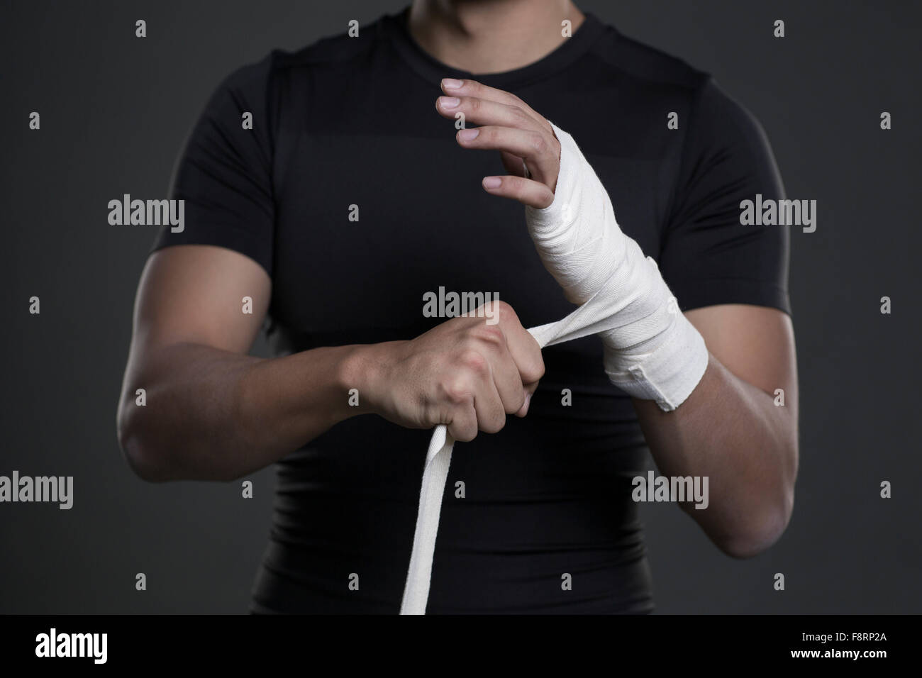 Boxer wrapping hands Stock Photo - Alamy