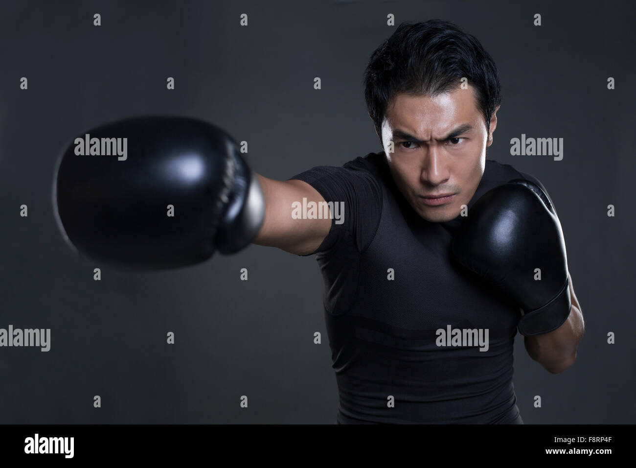 Standing arms up boxing glove looking away boxing glove hi-res stock ...