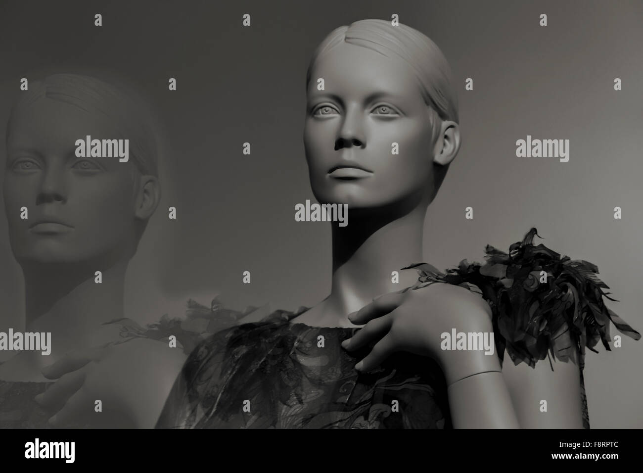 Creative double portrait of a dummy in an elegant pose. Digitally ...