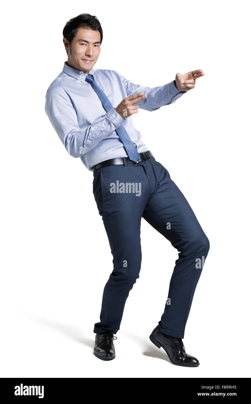 Young businessman pointing Stock Photo - Alamy