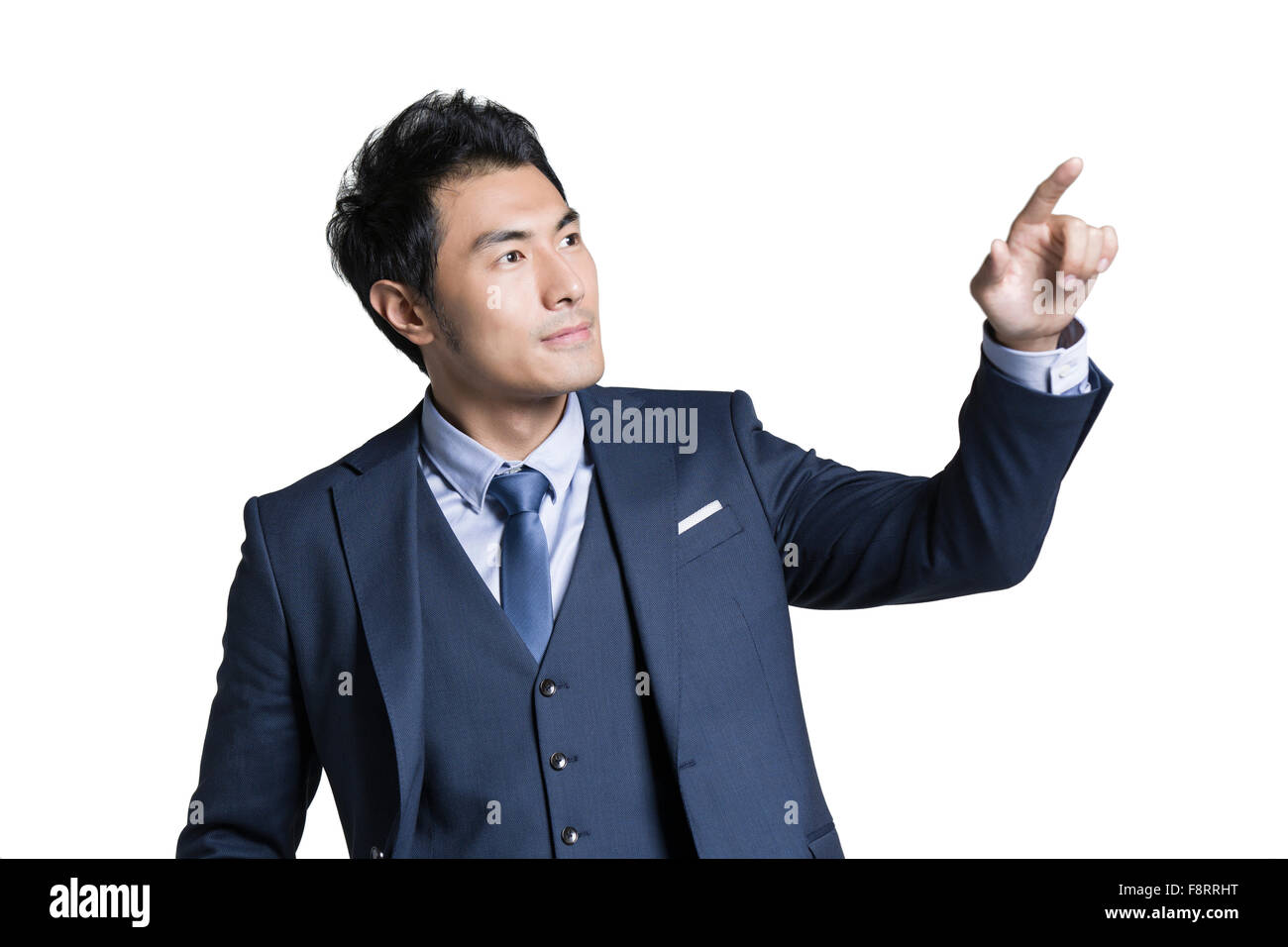 Young businessman pointing Stock Photo - Alamy