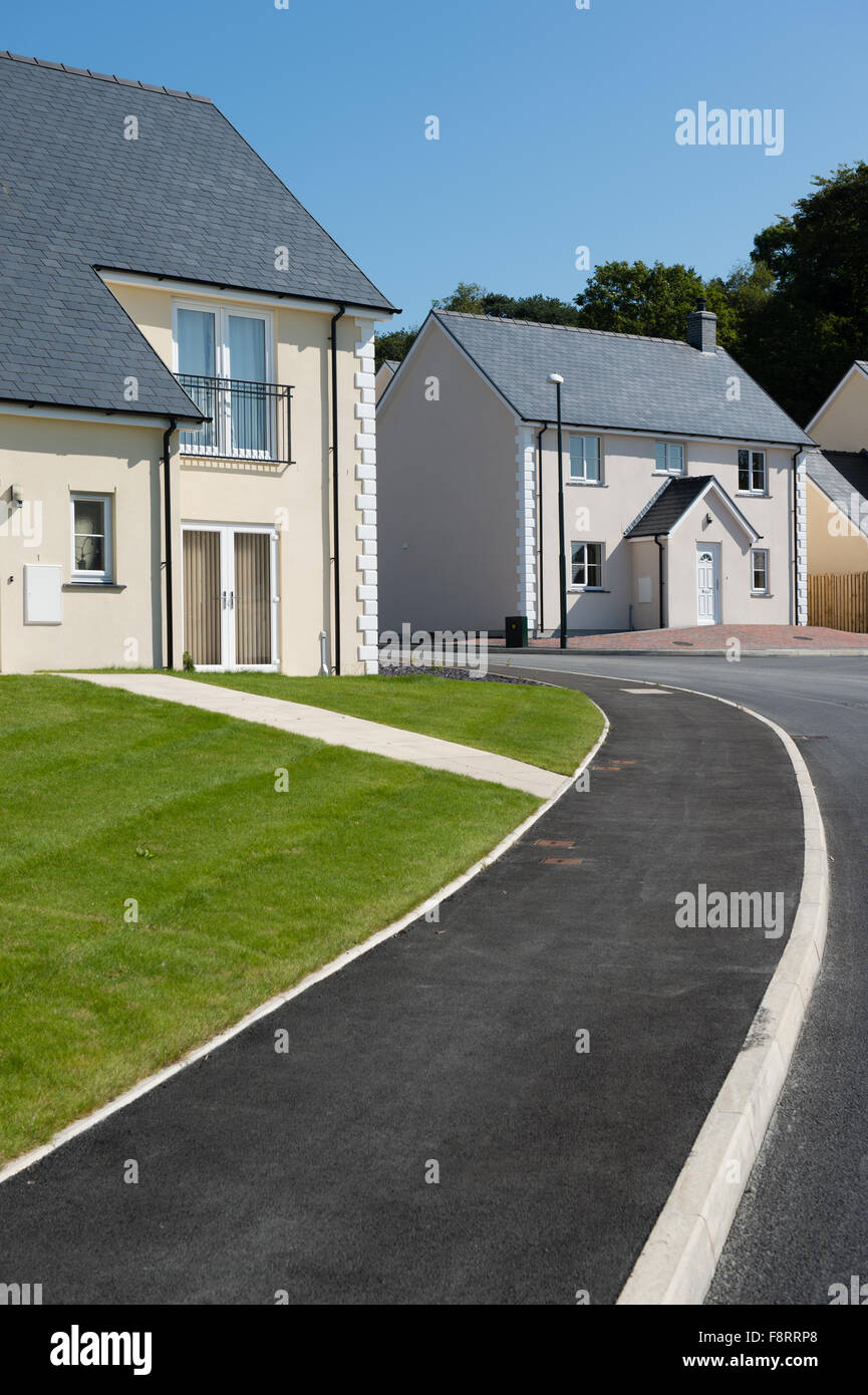 New 'executive' style detached and semi-detached houses on a suburban ...