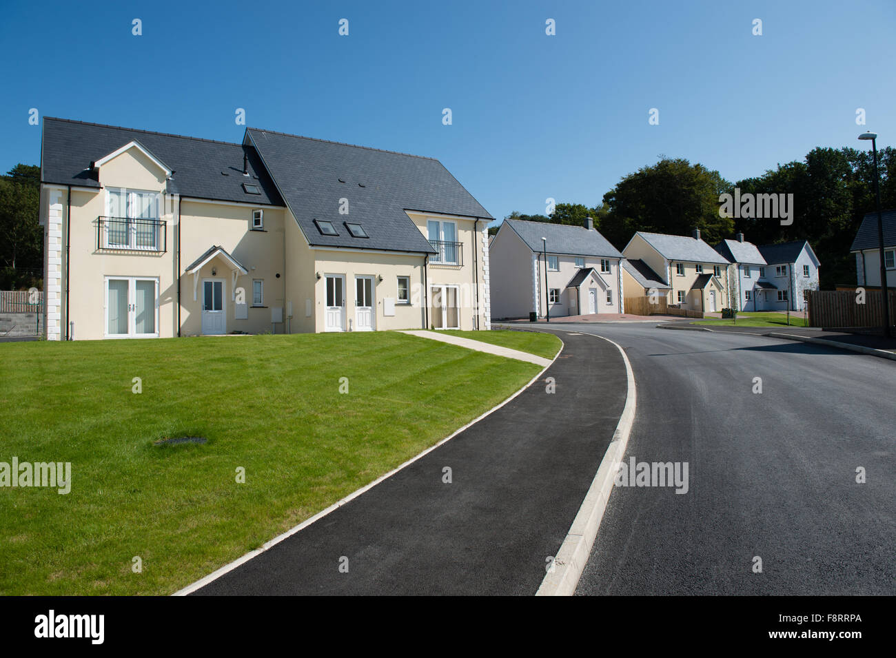 New 'executive' style detached and semi-detached houses on a suburban ...