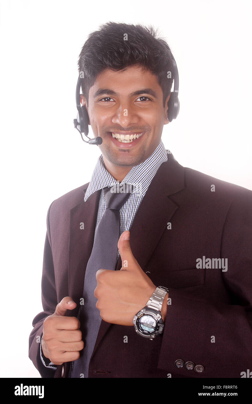 Smiling young call center executive Stock Photo - Alamy