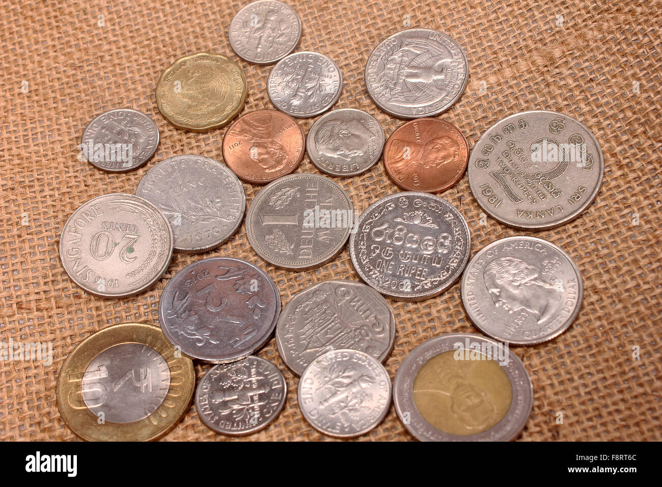 Heap of coins of different countries Stock Photo - Alamy