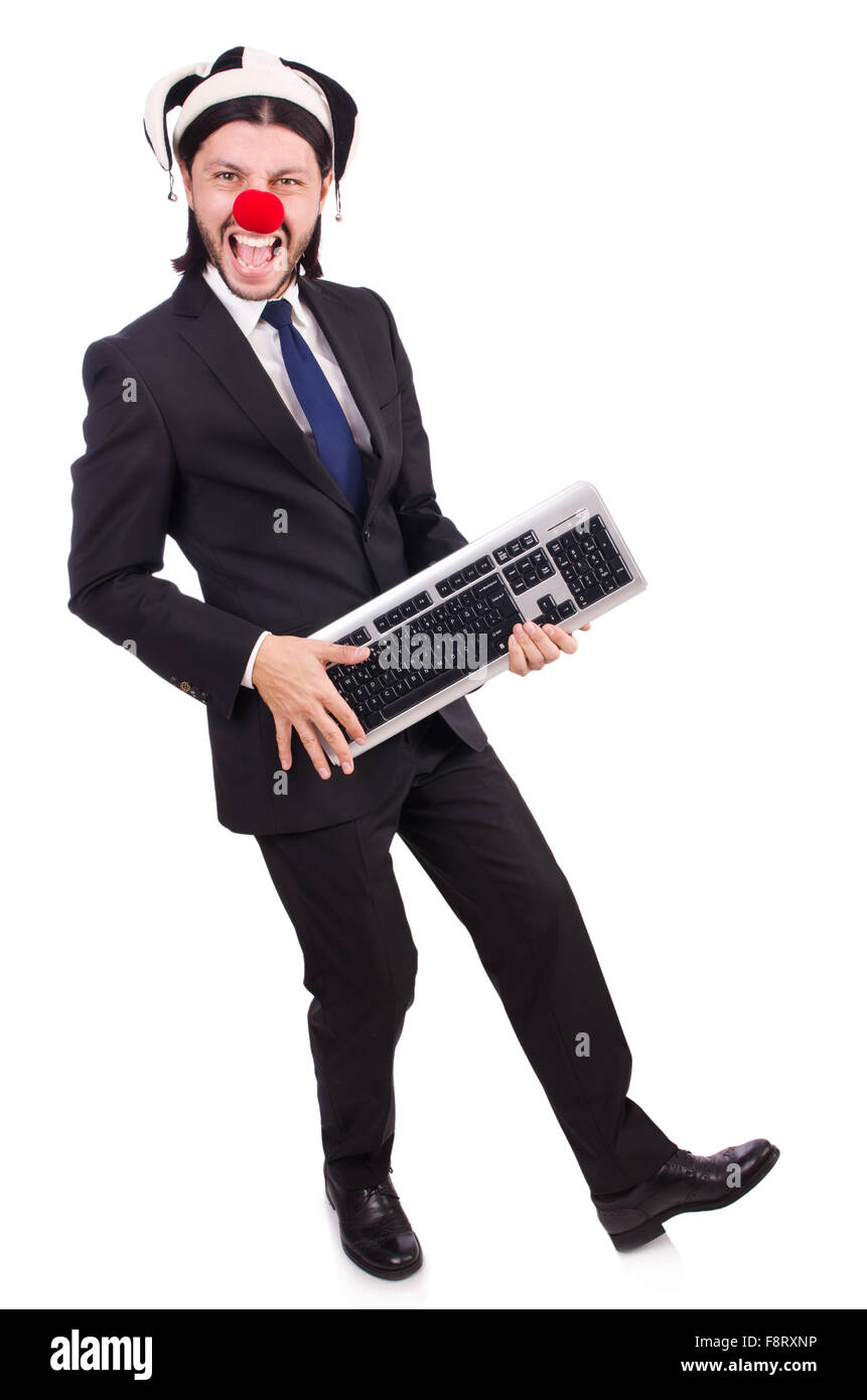 Funny clown with keyboard isolated on white Stock Photo - Alamy