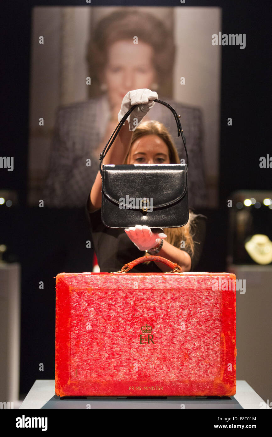 London, UK. 11 December 2015. A Christie's employee holds up on of Mrs ...