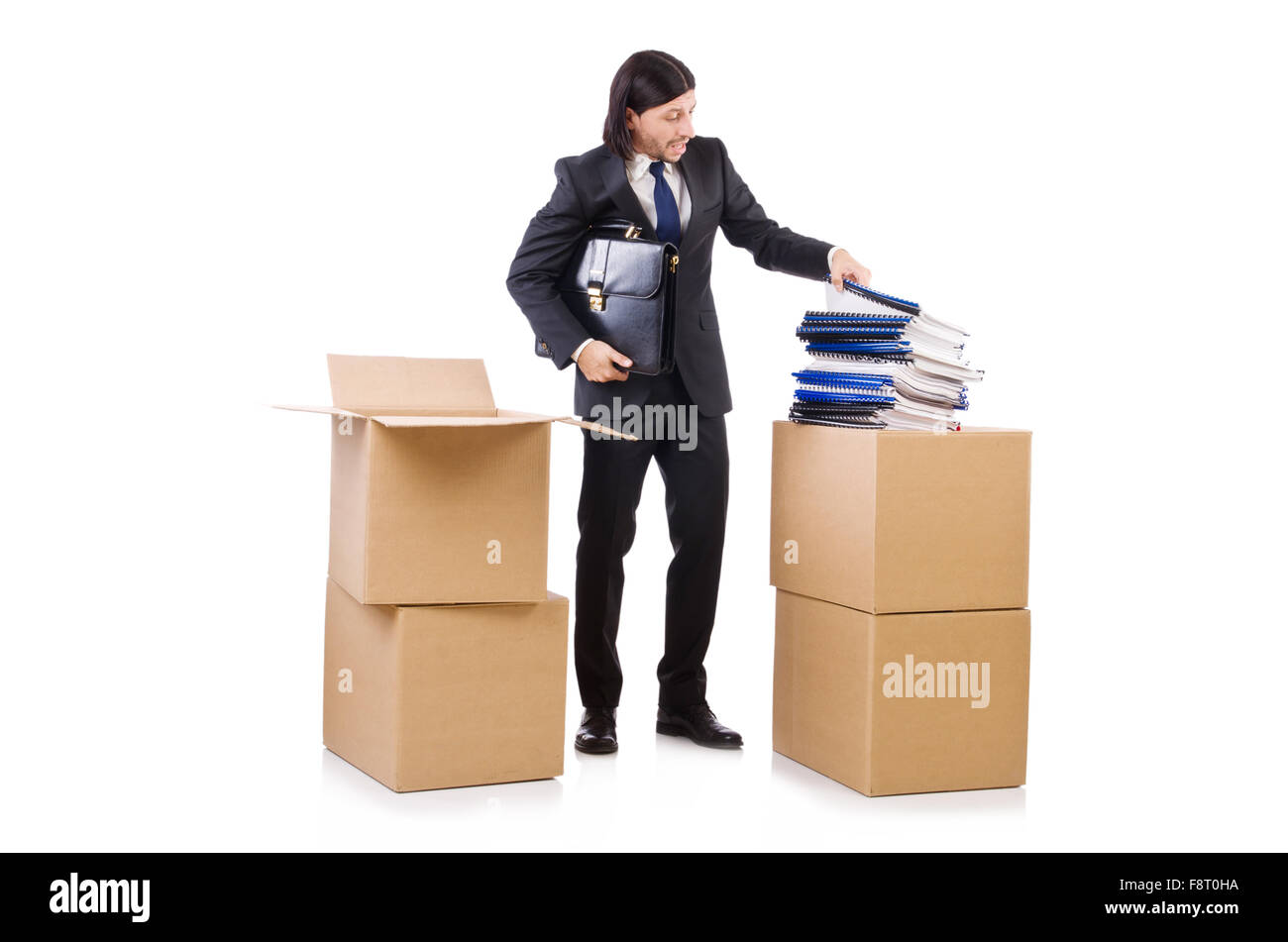 Man with boxes full of work Stock Photo - Alamy