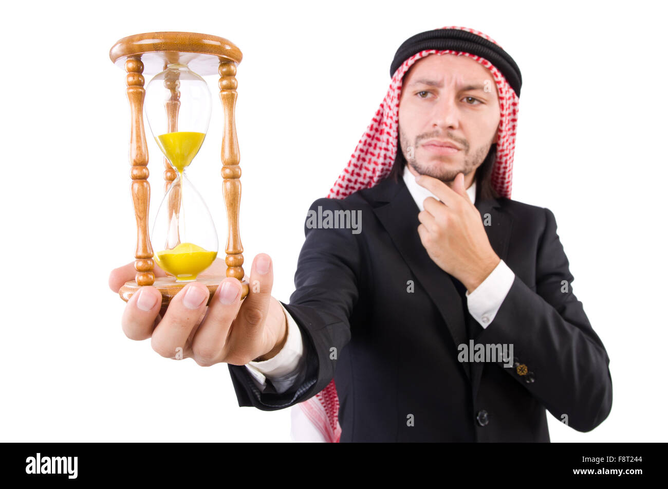 Arab man thinking about passage of time Stock Photo - Alamy
