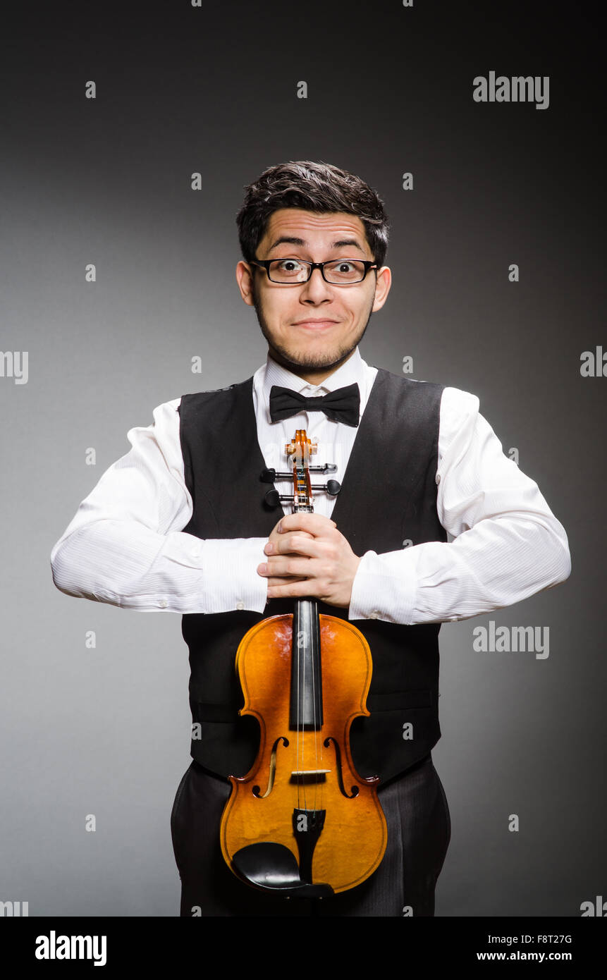 Funny violin player with fiddle Stock Photo - Alamy