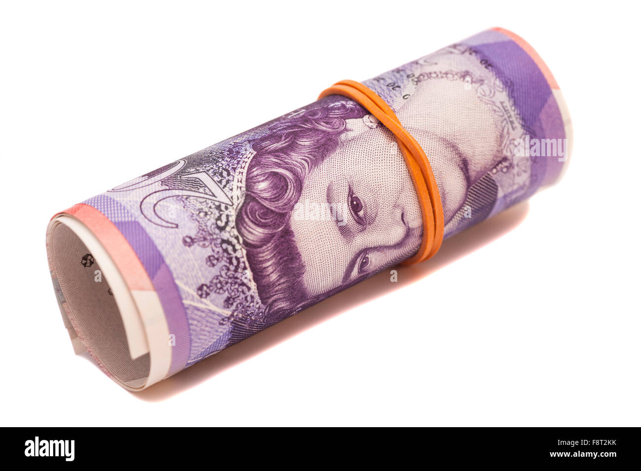 money british pounds sterling gbp under rubber band isolated Stock ...