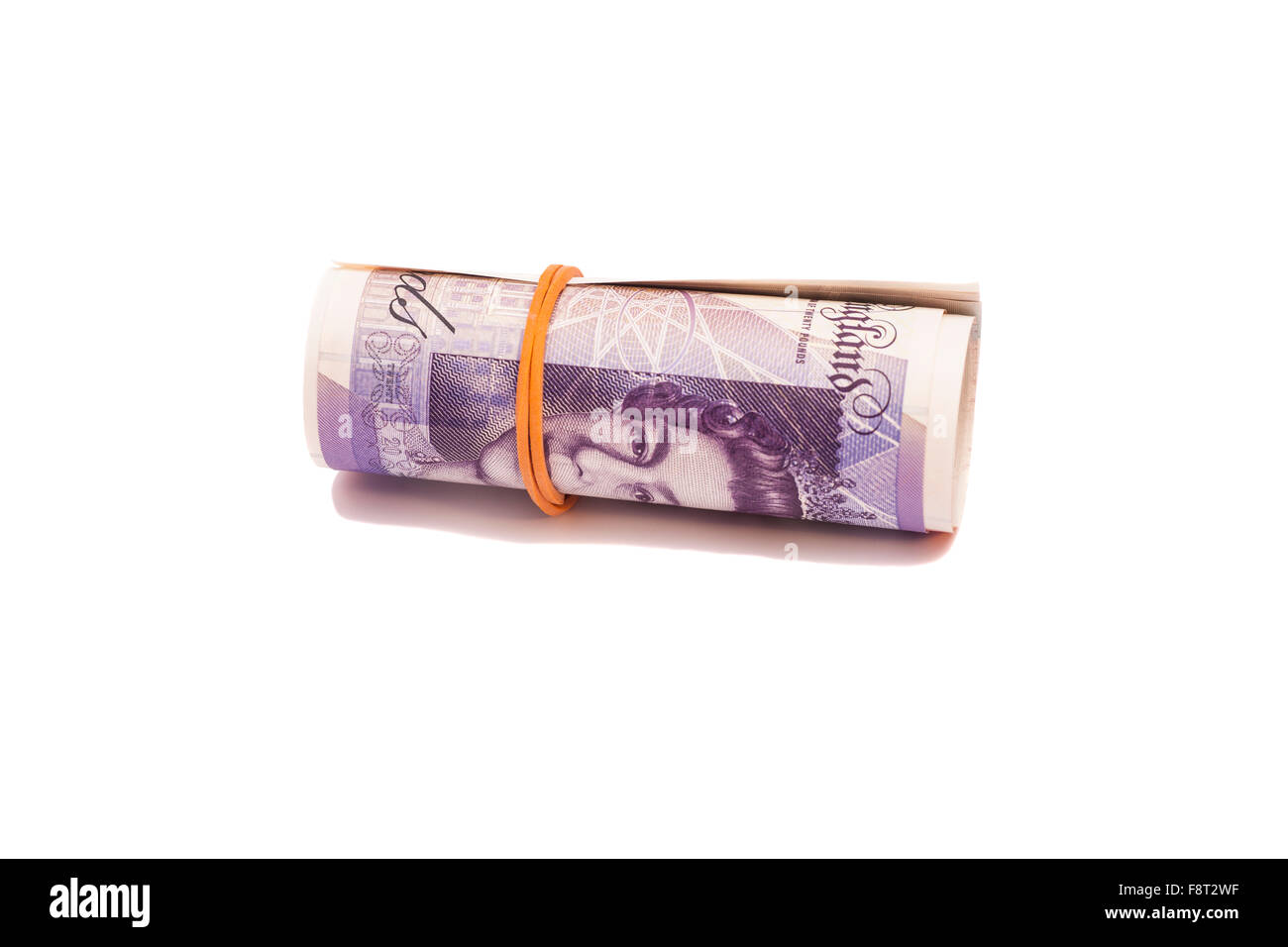 money british pounds sterling gbp under rubber band isolated Stock ...