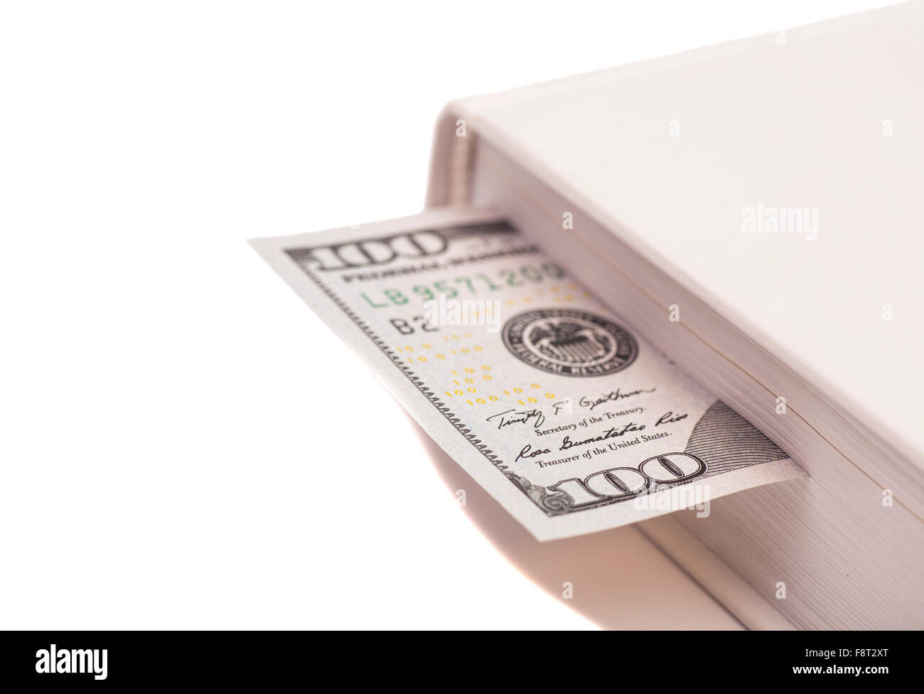 Dollars in Book Stock Photo - Alamy