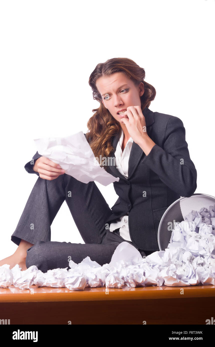 Woman with lots of discarded paper Stock Photo - Alamy