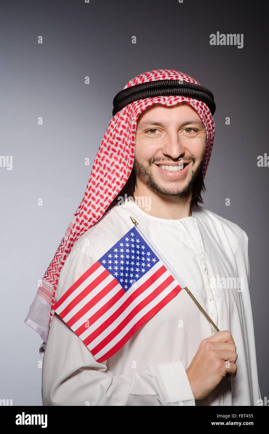 Arab man with united states flag Stock Photo - Alamy
