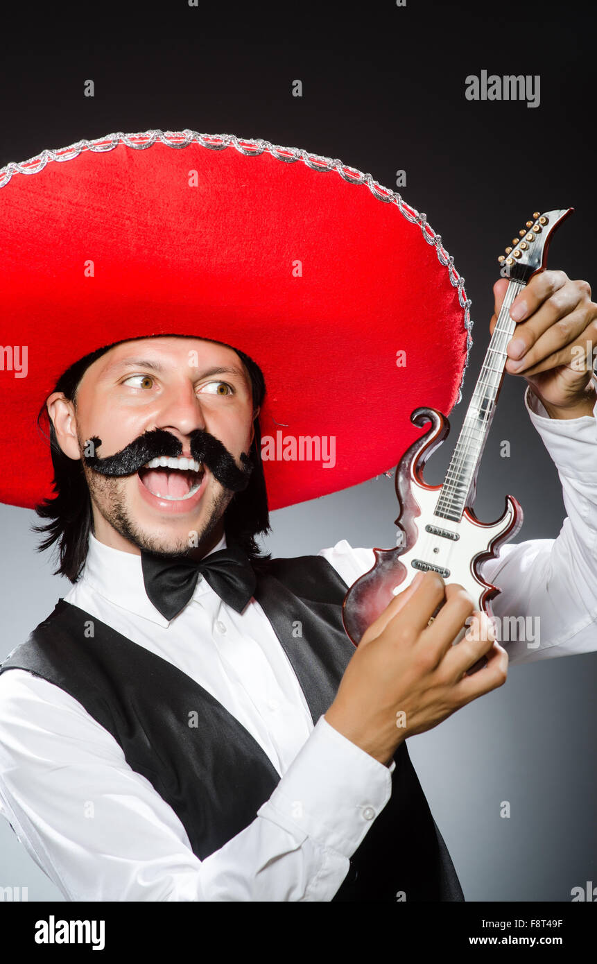Mexican man with guitar in music concept Stock Photo - Alamy